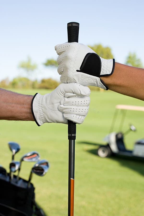 People holding golf club stock photo. Image of decision - 62533852