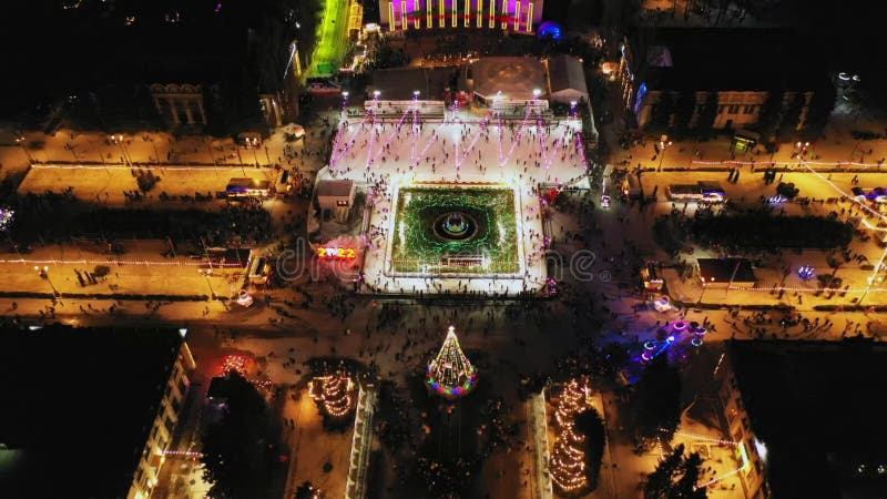 People Ice Skating on a Large Ice Rink , Aerial Top Down View from High ...