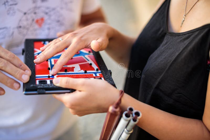 People with Impaired Vision Using Tactile Maps, 3D Models of Town ...