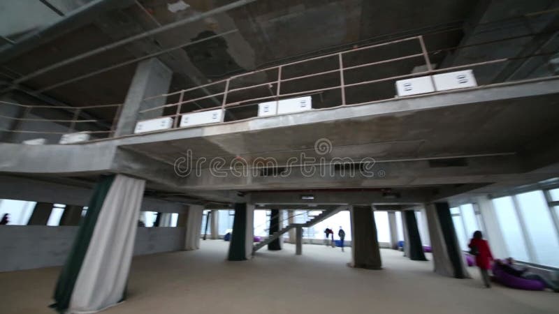 People in Indoor Observation Deck with Glass Wall Stock Video - Video ...