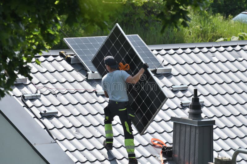 Installing a Solar Cell on a Roof. Stock Image - Image of installation ...
