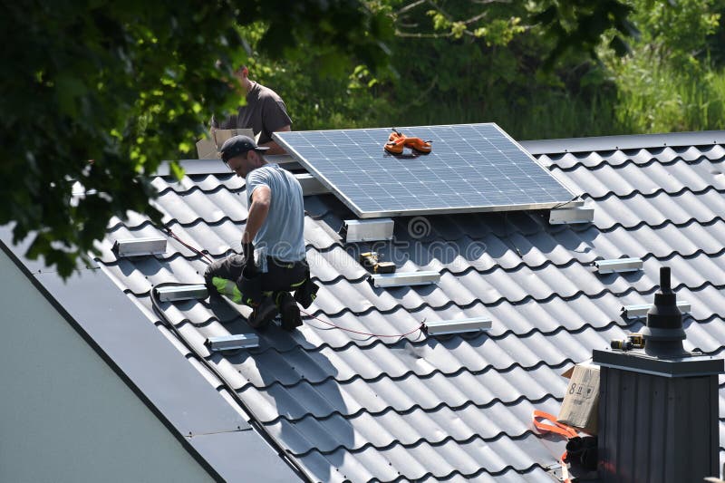 Installing a Solar Cell on a Roof. Stock Image - Image of installation ...