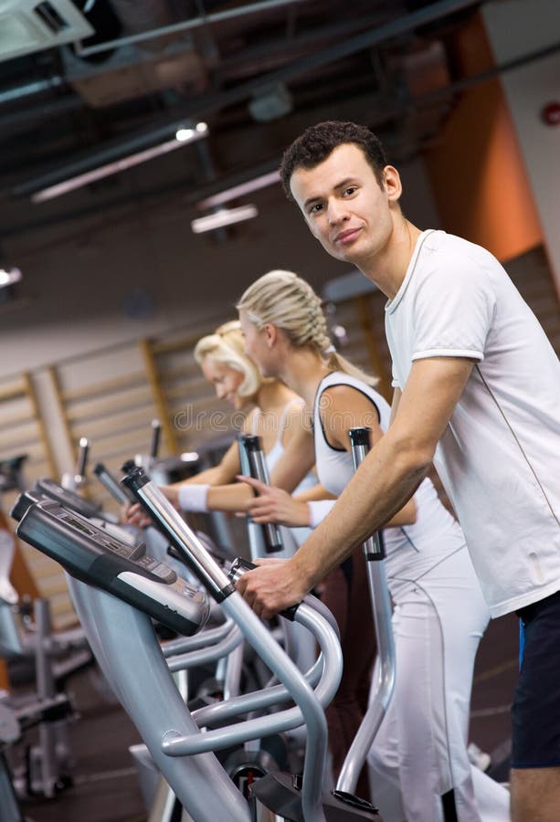 People jogging in a gym stock photo. Image of smile, beauty - 7756078