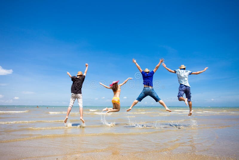 People Jumping at the Beach Stock Image - Image of jump, play: 20992767