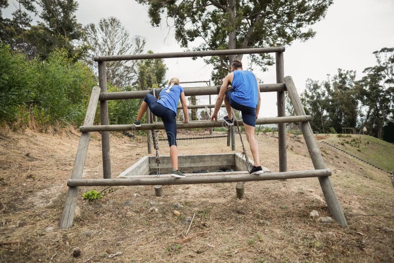 People Jumping Over the Hurdles during Obstacle Course Stock Photo ...