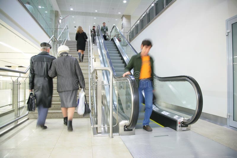 People on Ladder and Escalator Stock Image - Image of mall, building ...