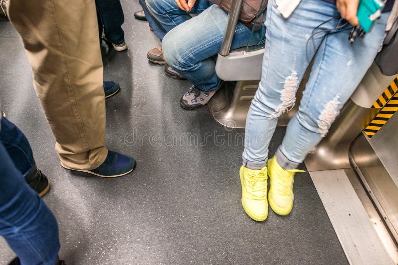 People Legs and Feet Inside Subway Train, Blurred View Stock Photo ...