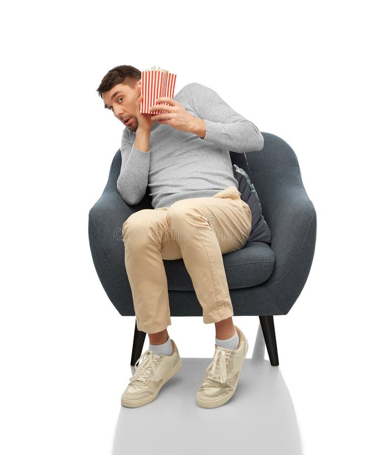 Scared Man with Popcorn Sitting in Chair Stock Image - Image of adult ...