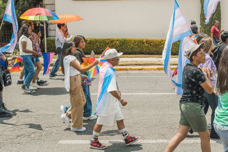 People from the LGBT Community Carrying Multi-colored Flags at the ...