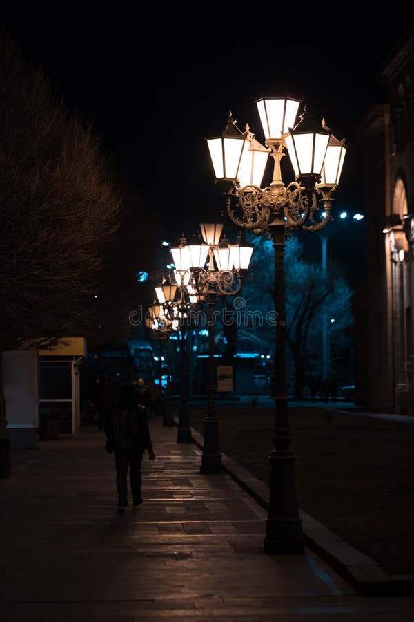 People with Light Lamp in Street Stock Photo - Image of evening ...