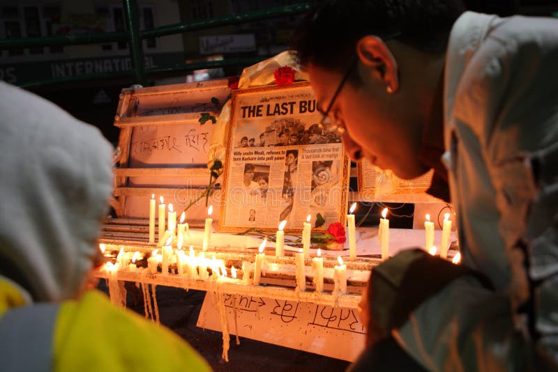 People light up candles editorial photo. Image of night - 12832101