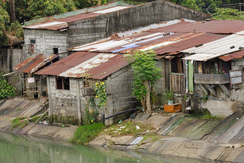 People Living in Poverty Along the Canals of Manila Philippines Stock ...