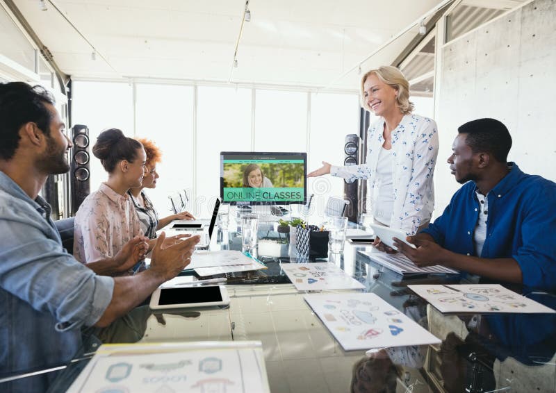 People Looking at a Computer with E-learning Information in the Screen ...