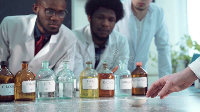 People Looking at the Cup while Experiment Stock Video - Video of ...