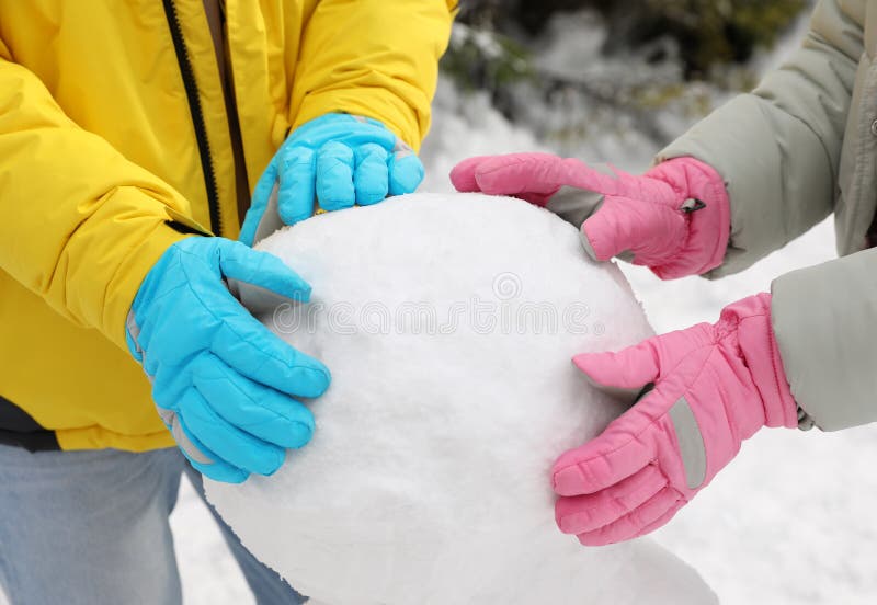 People Making Snowman Outdoors. Winter Vacation Stock Image - Image of ...