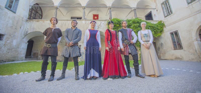 People in Medieval Clothes Pose in Front of Castle Editorial Stock ...