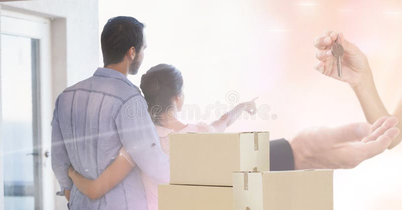 People Moving Boxes into New Home with Keys Stock Image - Image of ...