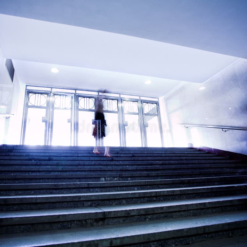 People moving on steps stock photo. Image of dark, arrival - 8117210
