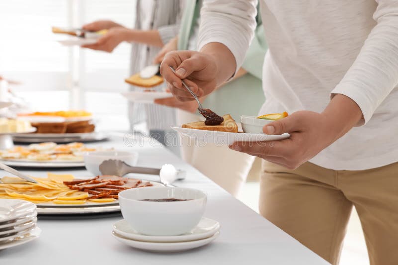 People Near Table with Different Dishes during Breakfast, Closeup ...