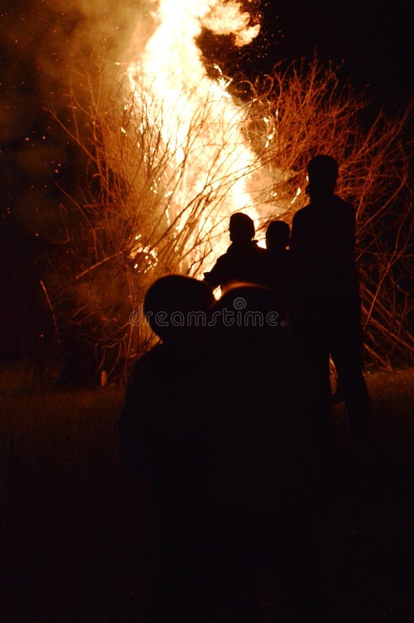 People Next To a Large Fire Lit at Night Stock Image - Image of font ...