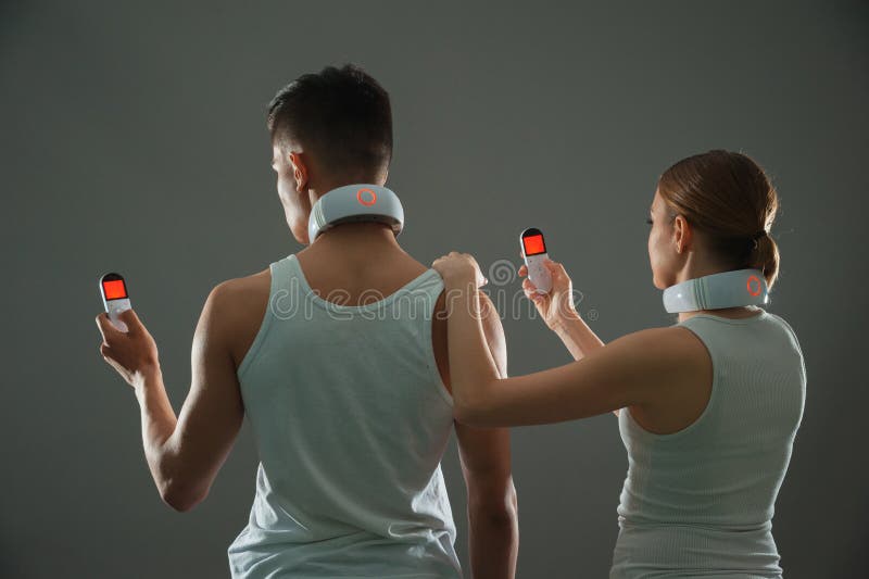People Operate the Neck Massager Using a Remote Control. Stock Image ...