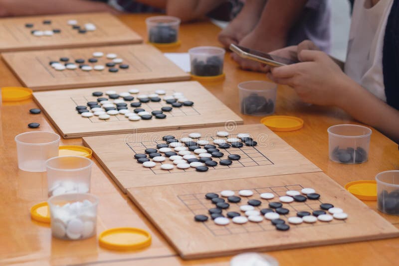 People Participate in the Go Game Stock Photo - Image of wooden ...