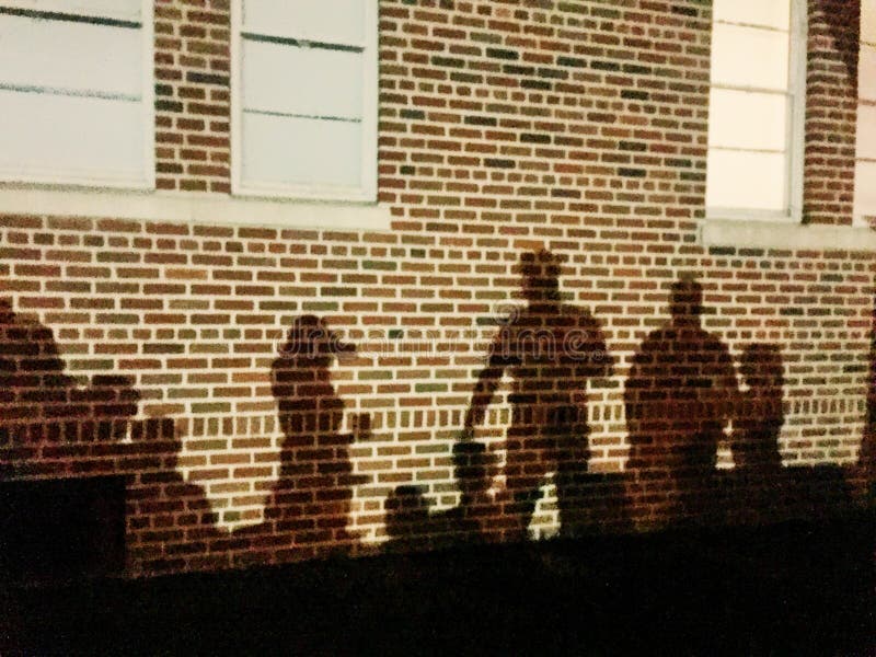 People at a Party Shadow on the Wall Stock Photo - Image of center ...