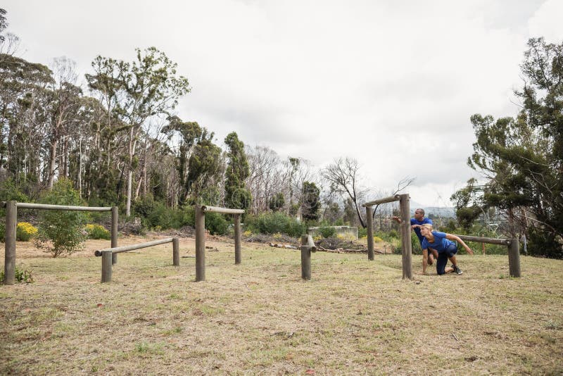 People Passing through Hurdles during Obstacle Course Stock Photo ...
