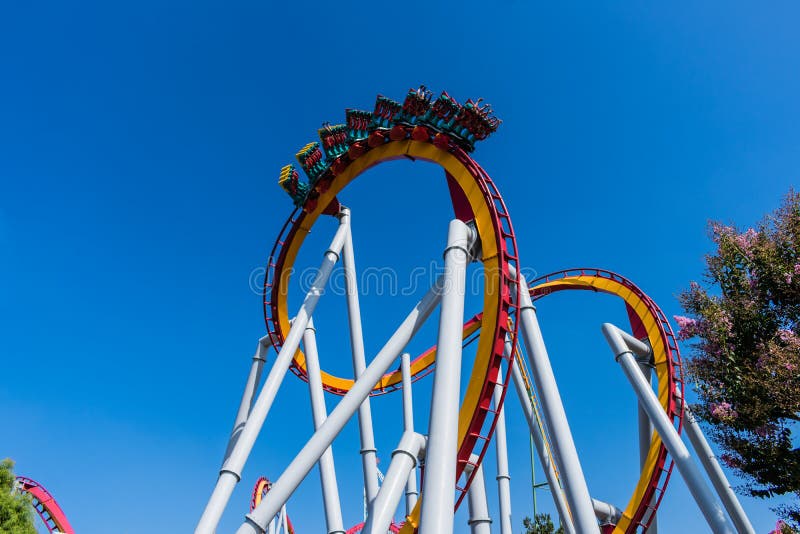People Up Side Down Riding a Roller Coaster Stock Photo - Image of ride ...