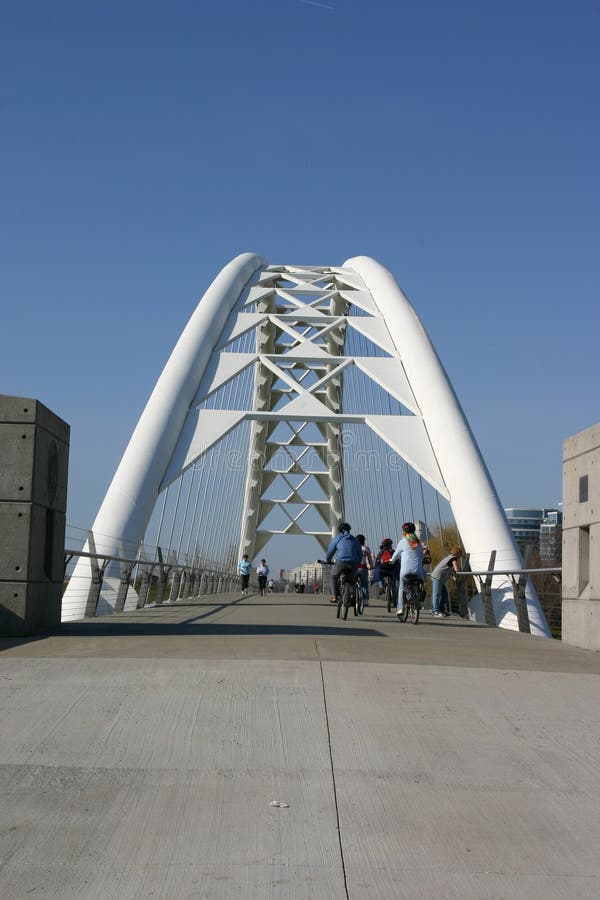 People on Pedestrian Bridge Stock Image - Image of people, legs: 2358183