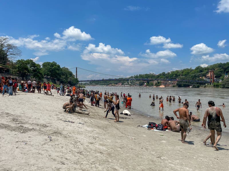 People Performing a Ritual Bath in the Holy River Ganges in Rishikesh ...