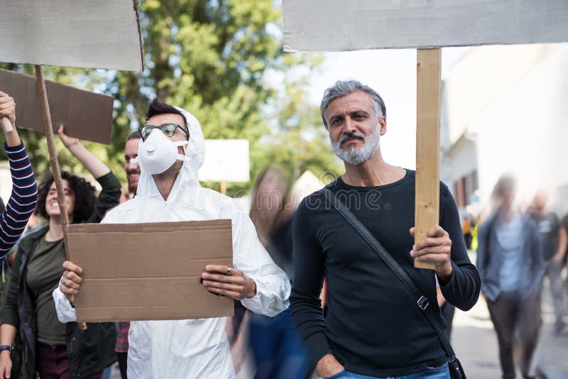 People with Placards and Protective Suit on Global Strike for Climate ...