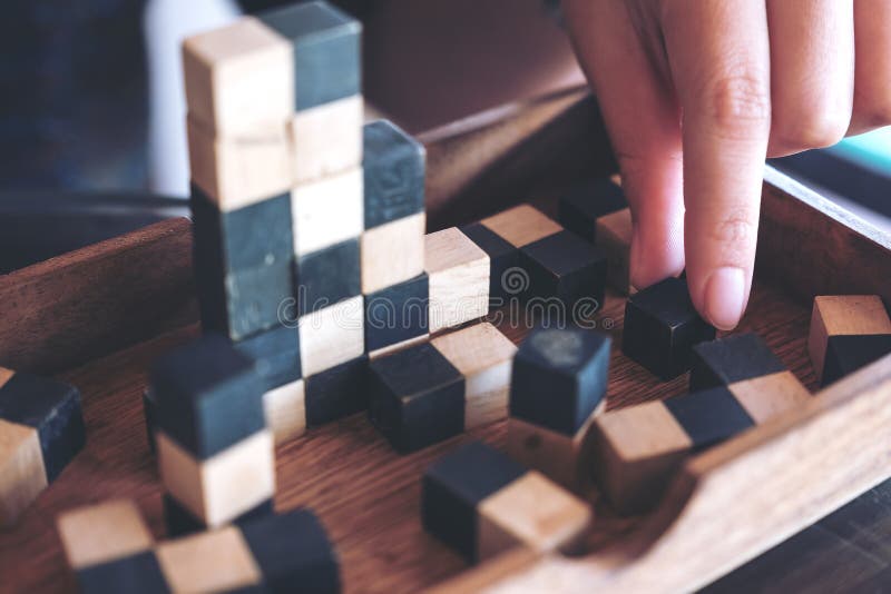 People Playing and Building Wooden Puzzle Game Stock Image - Image of ...