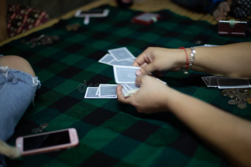 People Playing Card and Paying Coin Stock Image - Image of equipment ...