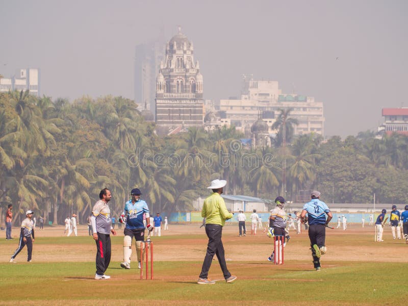 Mumbai, India - 5 December 2018: People Playing Cricket in the Central ... Mumbai, India - 5 December 2018: People Playing Cricket in the Central ...
