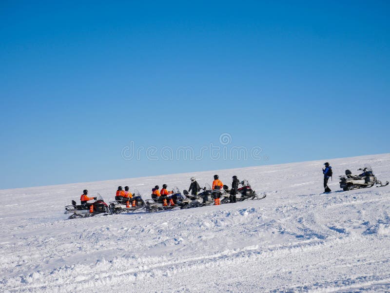 People Playing Electric Sled on the Ice Field Editorial Image - Image ...