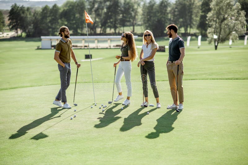 People Playing on a Golf Course Stock Image - Image of golfclub, adult ...