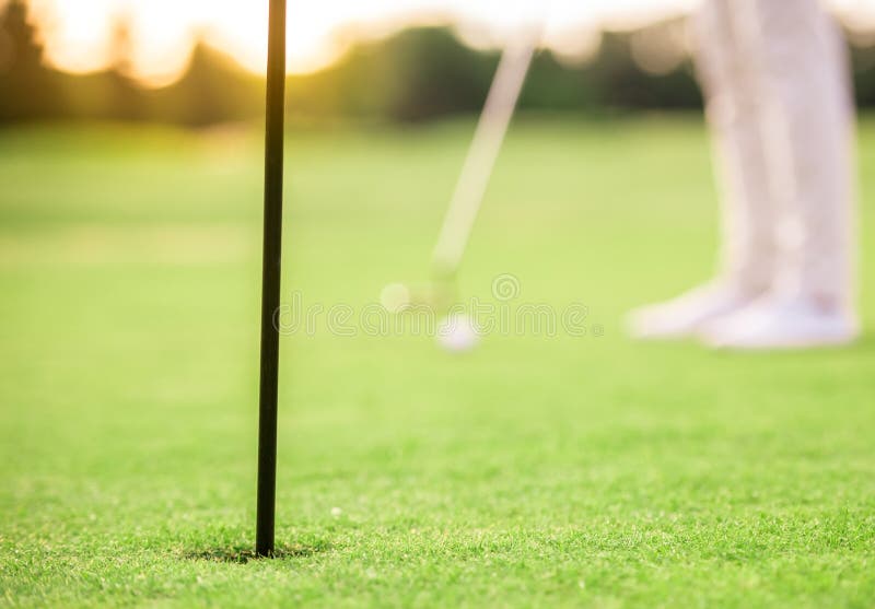 People playing golf stock image. Image of light, active - 100038687