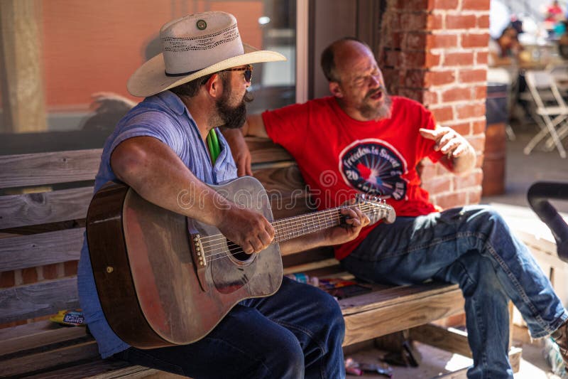 People Playing Guitar and Singing at an Event Editorial Image - Image ...