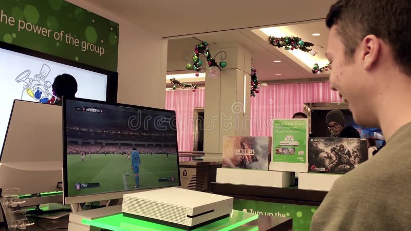 People Playing New Xbox Game at Microsoft Store Stock Footage - Video ...