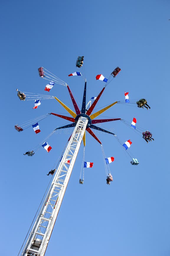 People in the Pods of a Carousel Stock Photo - Image of basket, vertigo ...