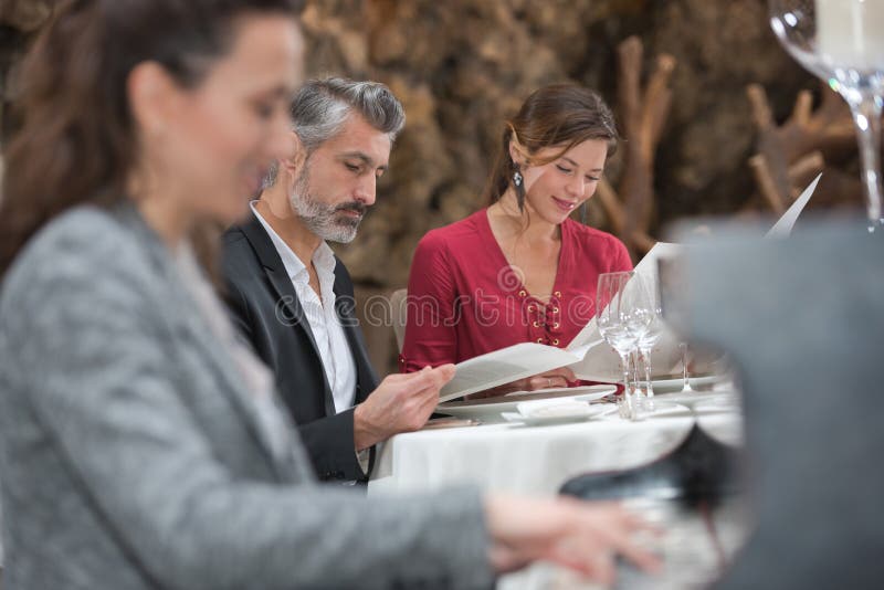 People in posh restaurant stock image. Image of choice - 312439461