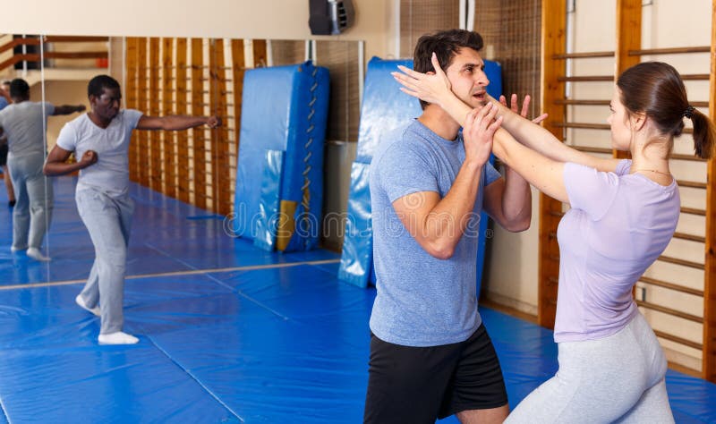 People Practicing Self Defense Techniques Stock Photo - Image of active ...