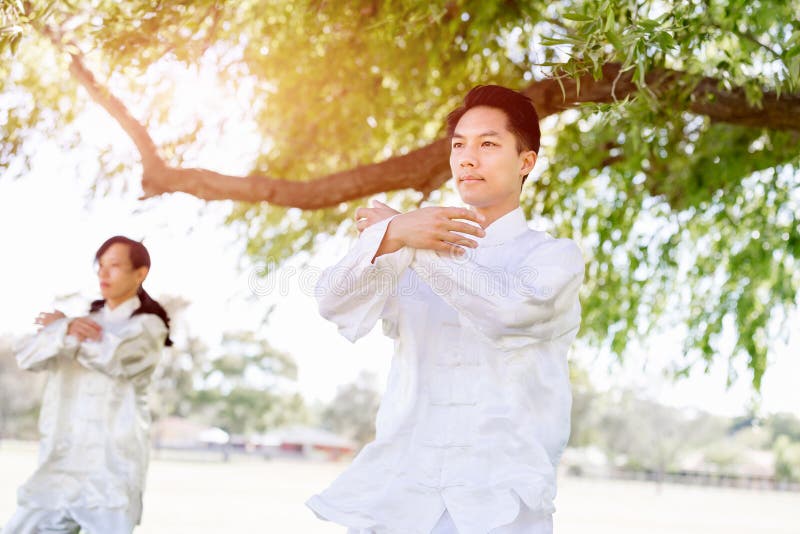 People Practicing Thai Chi in Park Stock Photo - Image of relax, soul ...