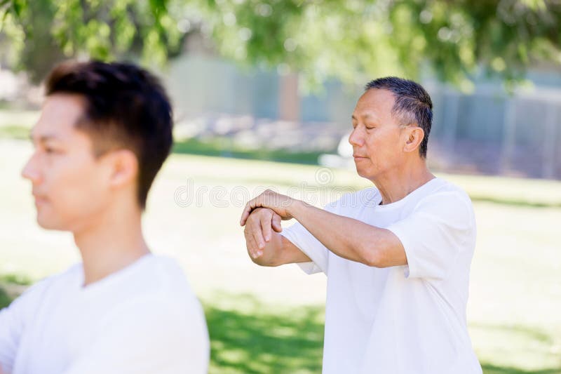People Practicing Thai Chi in Park Stock Image - Image of mind, outdoor ...