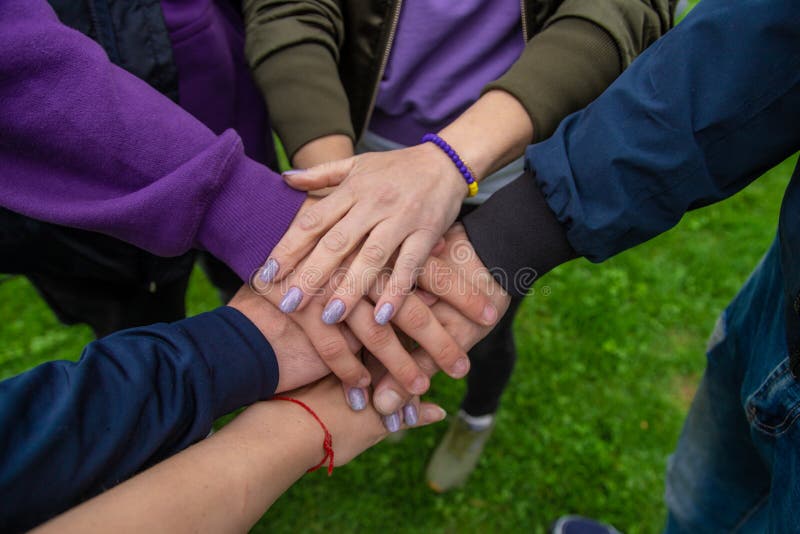 People Put Their Hands Together. Selective Focus Stock Photo - Image of ...
