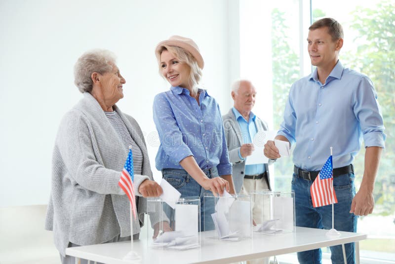 People Putting Ballot Papers into Boxes Stock Image - Image of boxes ...