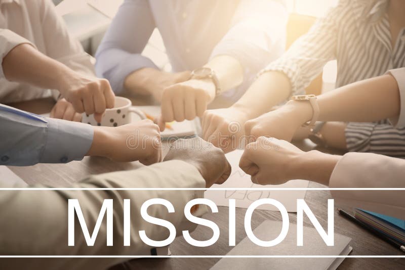 People Putting Hands Together at Table. Mission Concept Stock Image ...