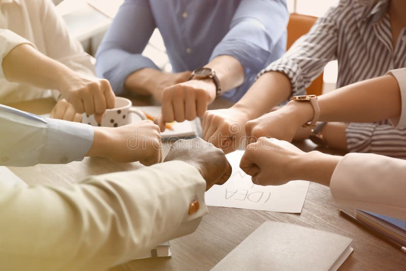 People Putting Hands Together at Table. Unity Stock Photo - Image of ...