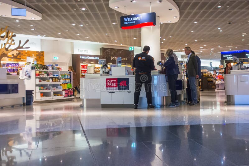 People Queuing at a Counter in a Shop at an Airport Editorial ...